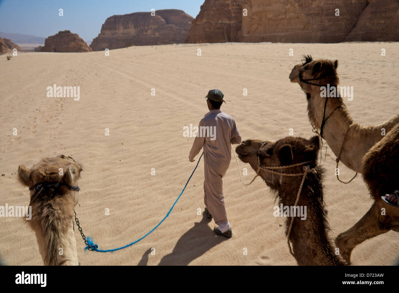 Boy riding camel hi-res stock photography and images - Alamy