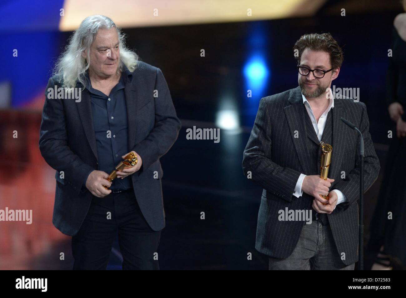 Hugh Bateup (L) and Uli Hanisch receive the 'Lola' for Best Production ...