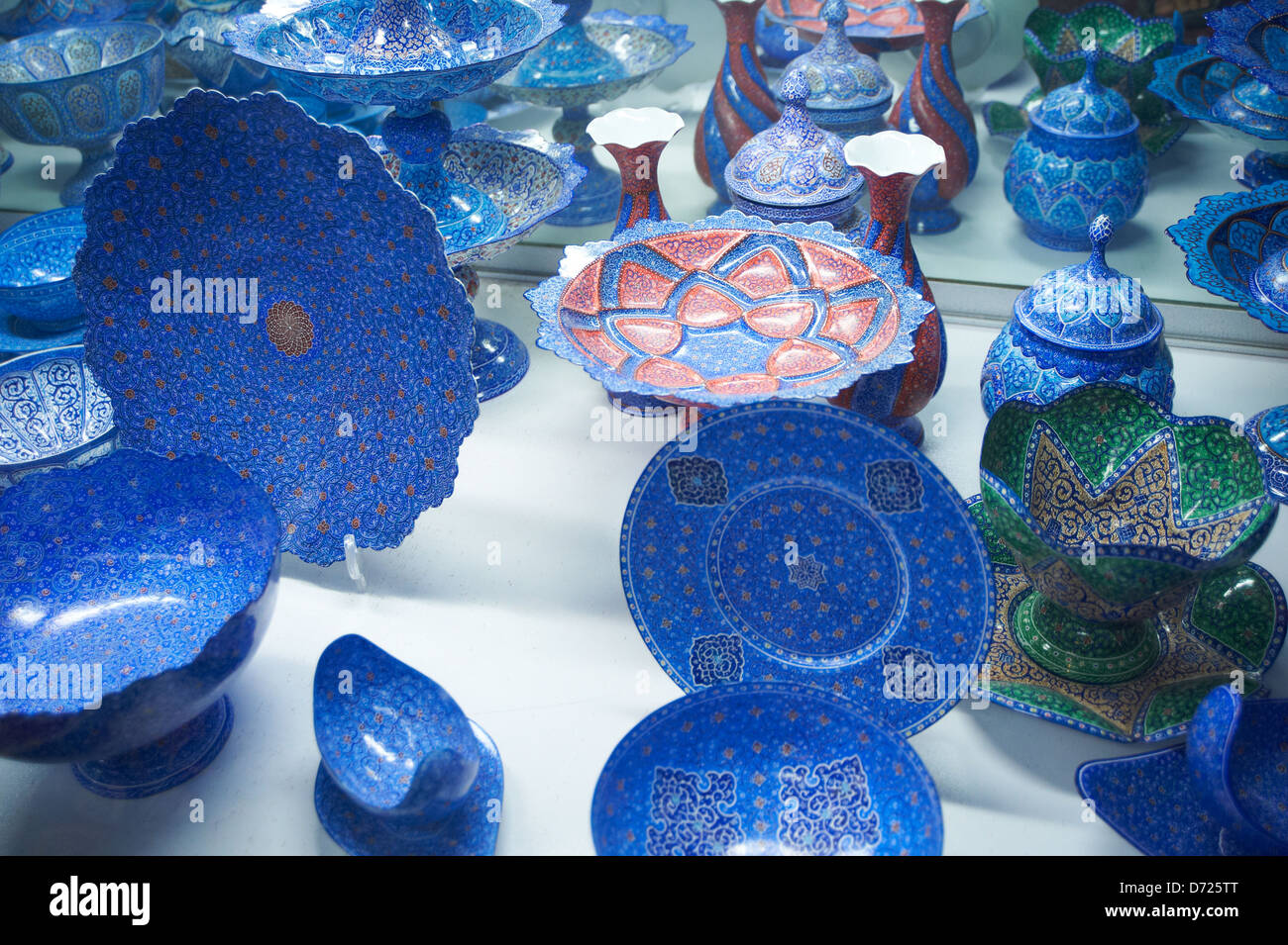 The famous blue enamel handicraft plates of Isfahan Stock Photo - Alamy