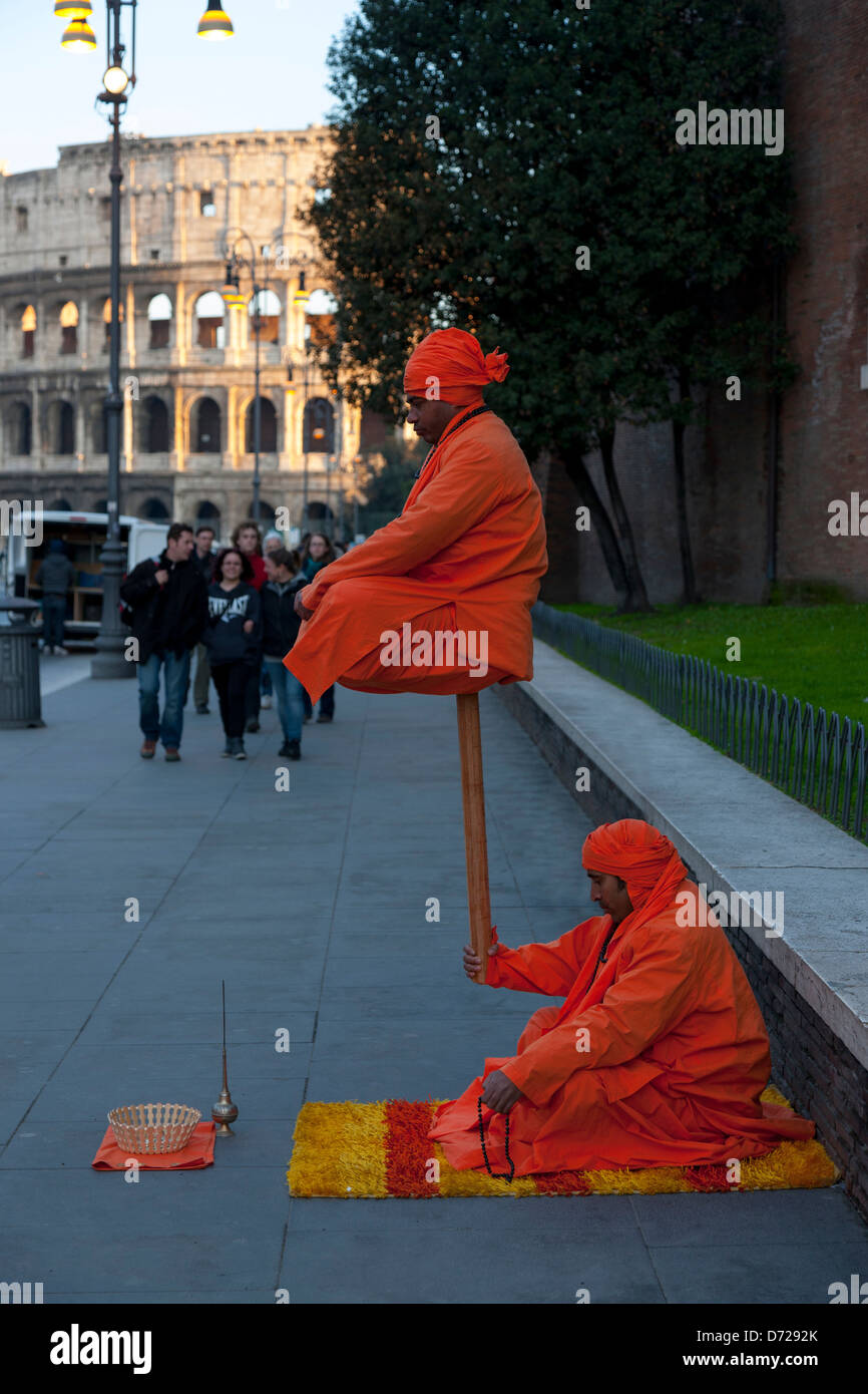 Indian street entertainers outside The Colosseum in Rome, Italy Stock ...