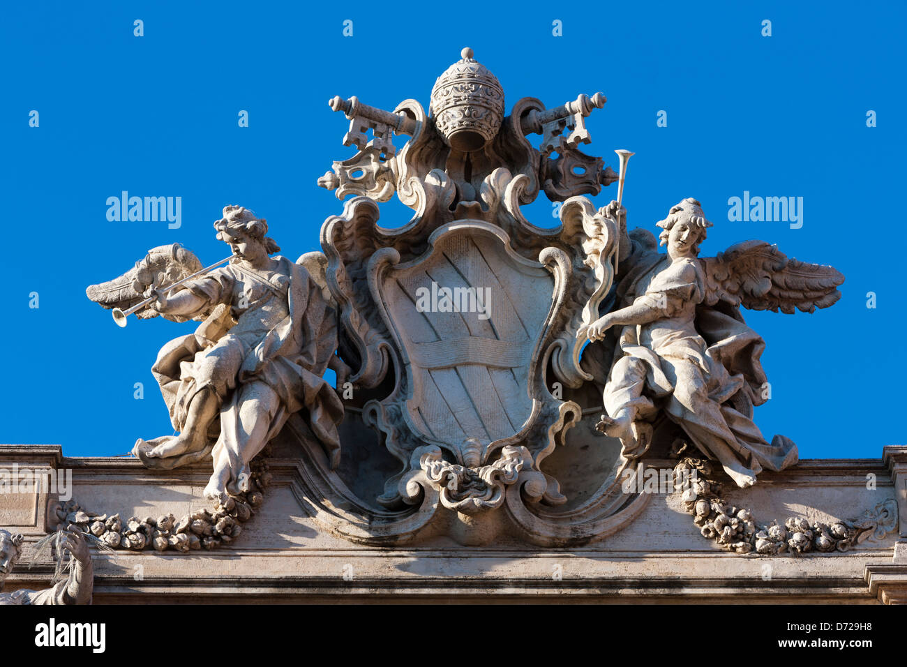 The heraldic shield at the top of the Trevi Fountain, Rome, Italy Stock ...