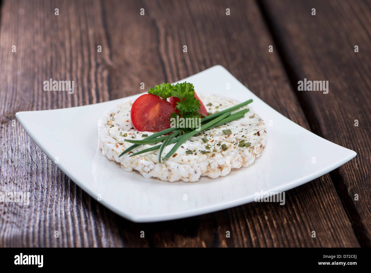 Diet food (rice cakes with healthy topping on a plate Stock Photo - Alamy