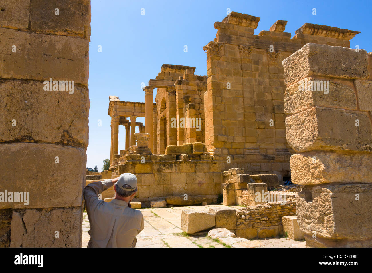 Tourist photographing ruins of Sbeitla, Tunisia Stock Photo - Alamy