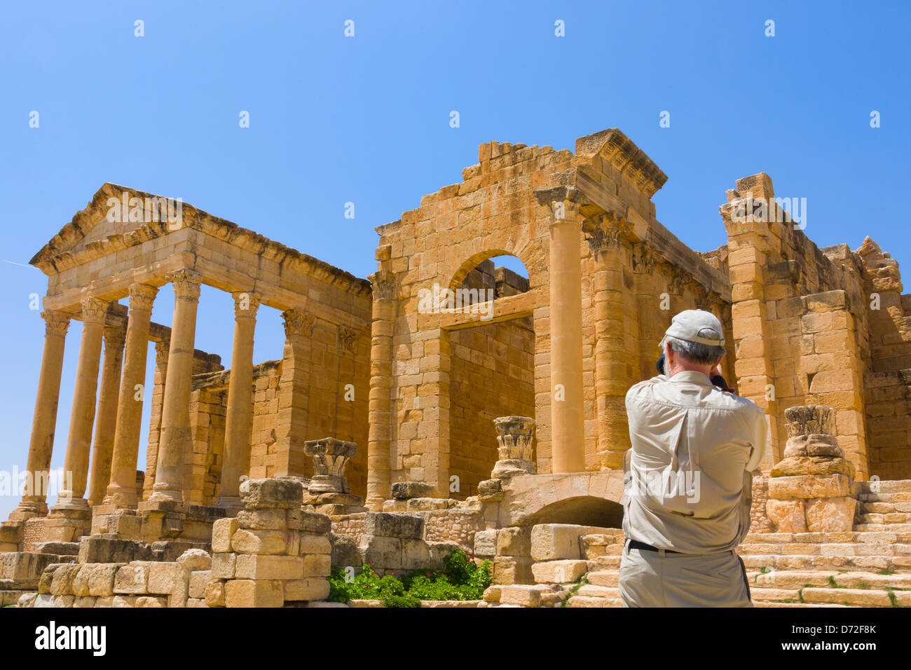 Tourist photographing ruins of Sbeitla, Tunisia Stock Photo - Alamy