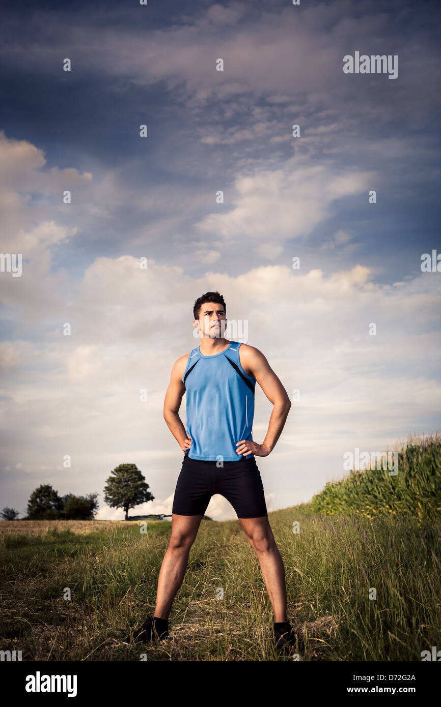 man jogging through the fields Stock Photo - Alamy