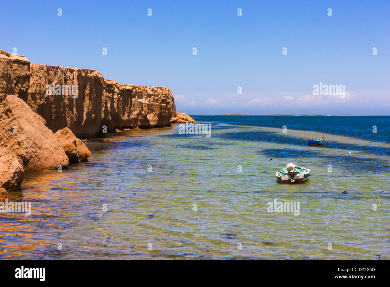 Island and fishing boat, Djerba, Tunisia Stock Photo - Alamy