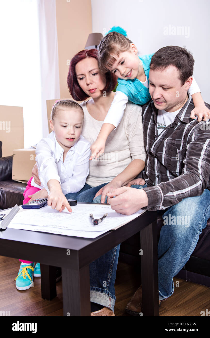 a young family by planning of a new home Stock Photo - Alamy