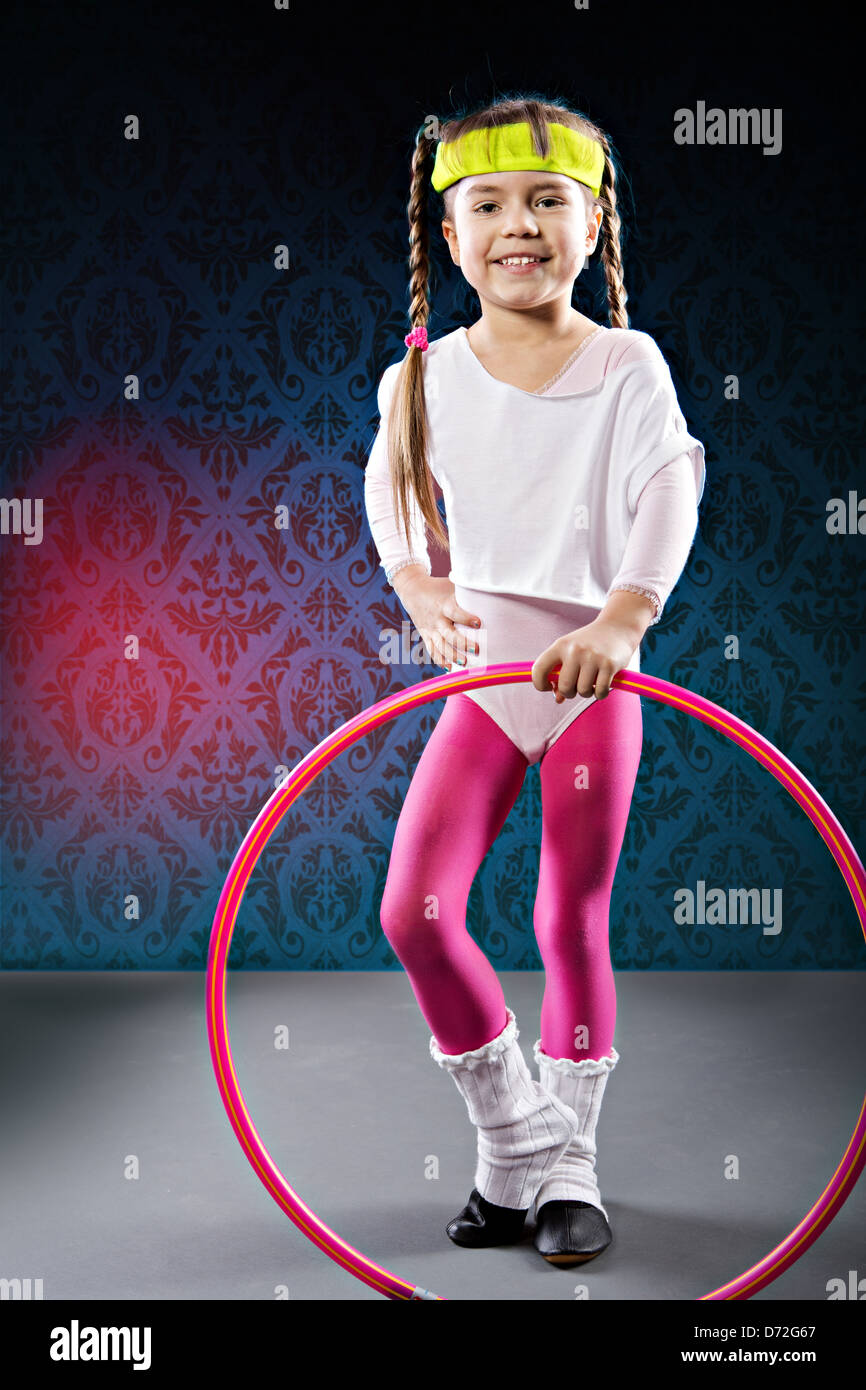 studio shot of a little girl at fitness exercise Stock Photo - Alamy