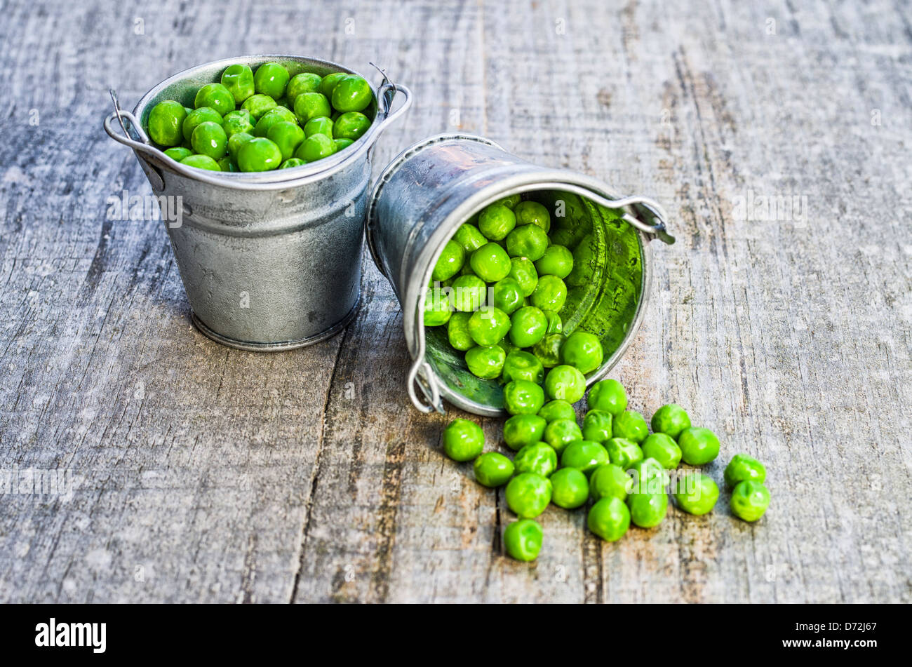 Peas out of a container Stock Photo - Alamy