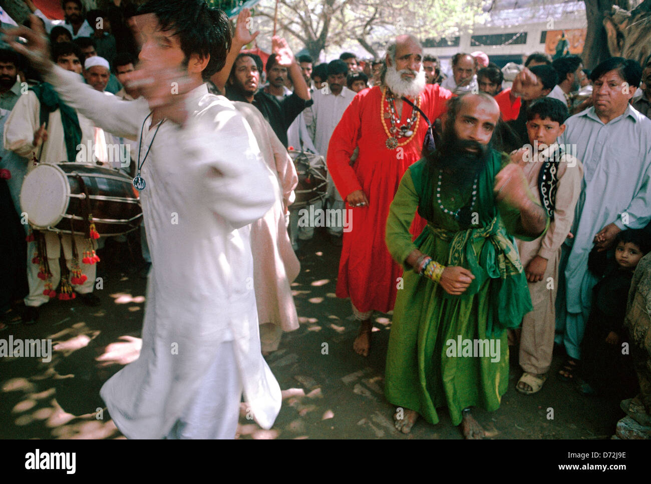 Fakirs are dancing to pay homage to a local sufi master during a death ...