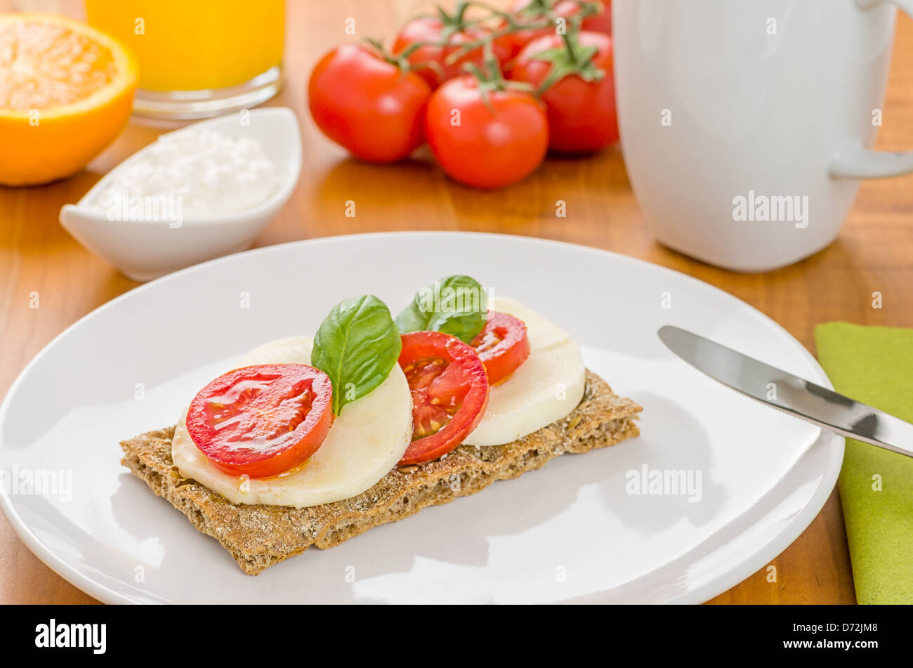 Tomato and mozzarella crispbread hi-res stock photography and images ...