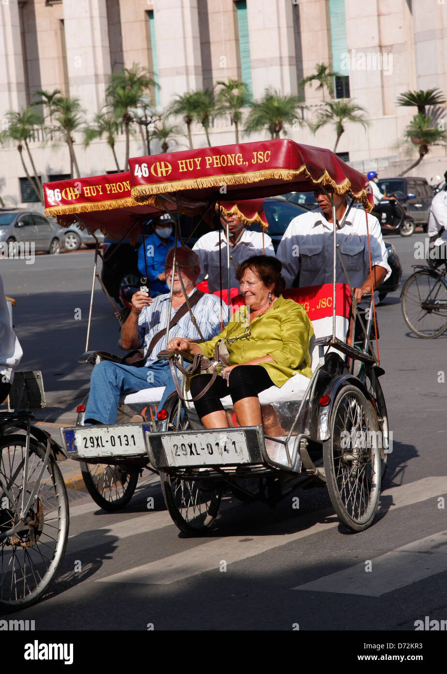 Hanoi, Vietnam, rickshaw driver with tourists Stock Photo - Alamy