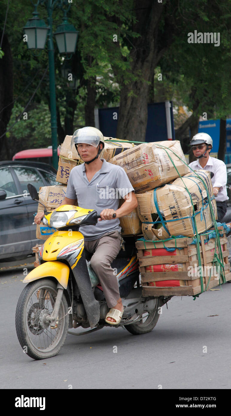 Hanoi, Vietnam, moped riders on the road Stock Photo - Alamy