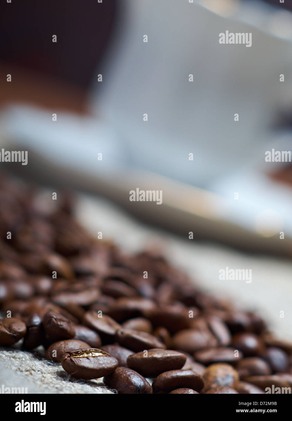 Coffee cup coffee beans background Stock Photo - Alamy