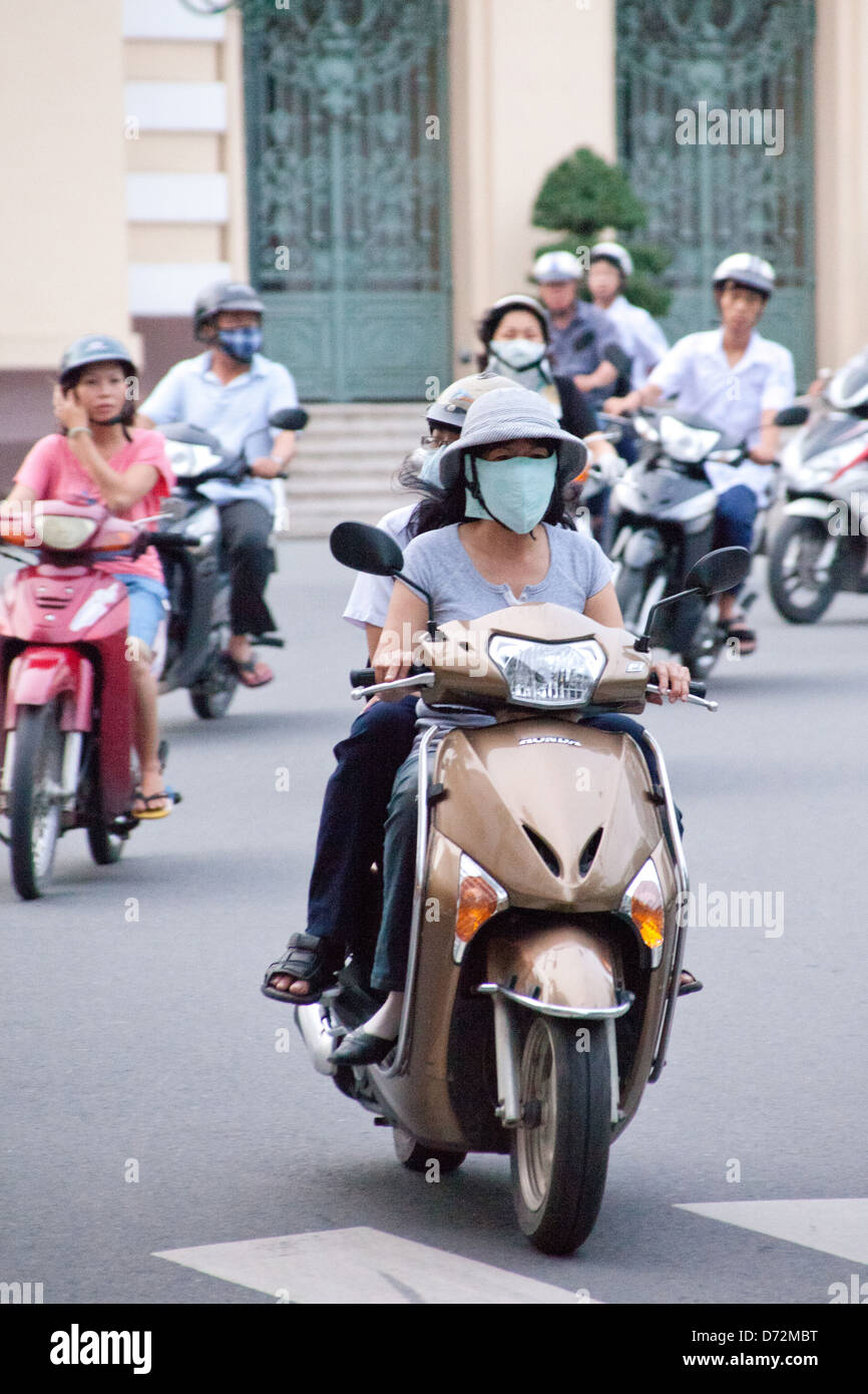 Ho Chi Minh City, Vietnam, moped drivers on the road Stock Photo - Alamy