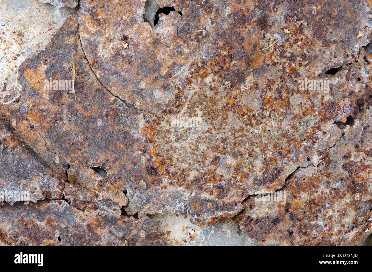 uneven cracked tin with rust stains background Stock Photo - Alamy