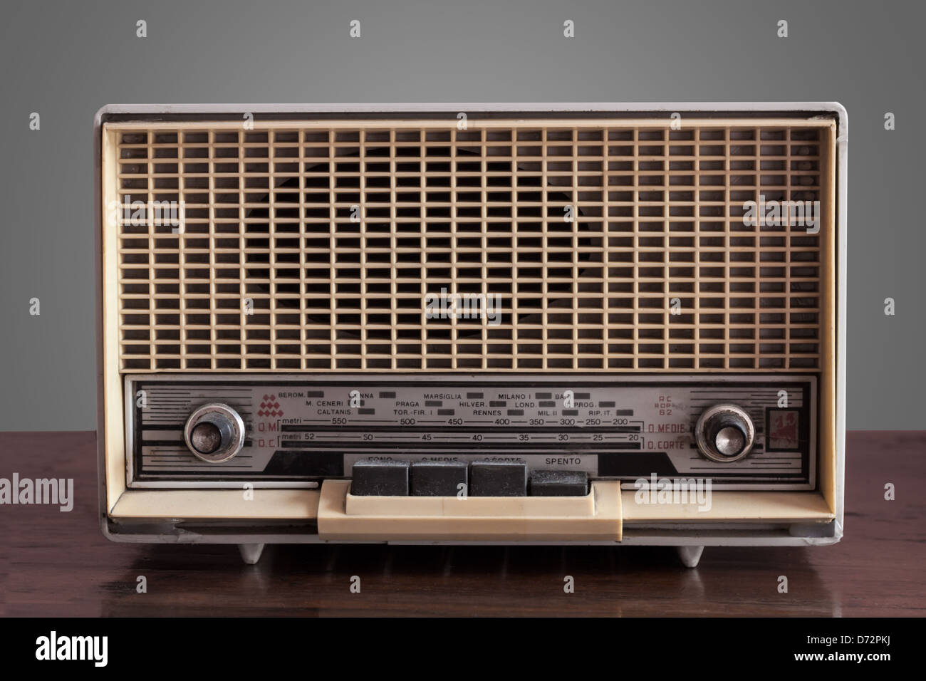 Italian vintage radio on grey background Stock Photo - Alamy