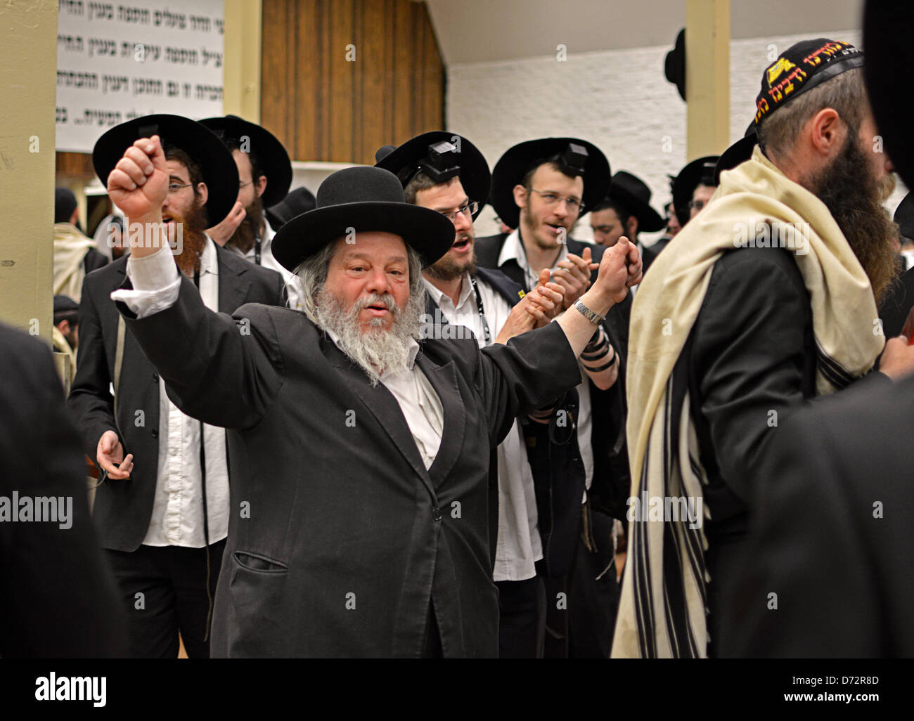 Jubilant religious Jewish man in prayer at morning services in Crown ...