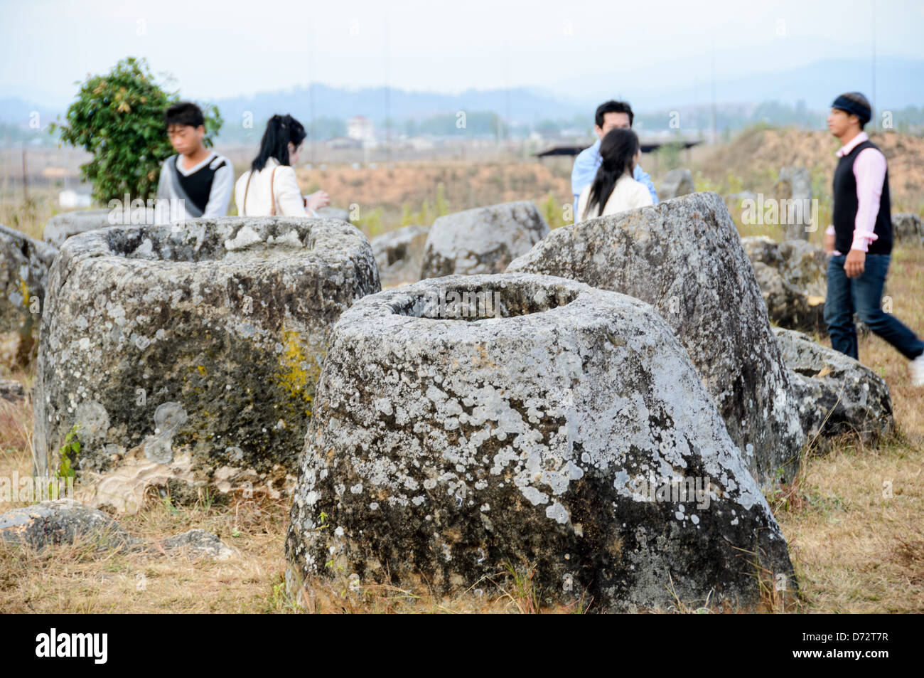 PHONSAVAN, Laos — Visitors amongst the stone jars at Site 1 of the ...