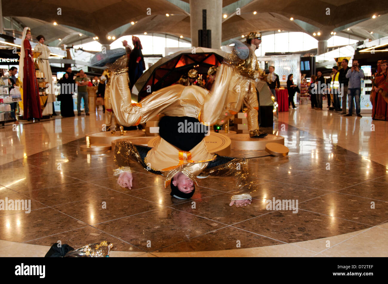 Jordan, Amman. Queen Alia International airport. Acrobats entertain ...