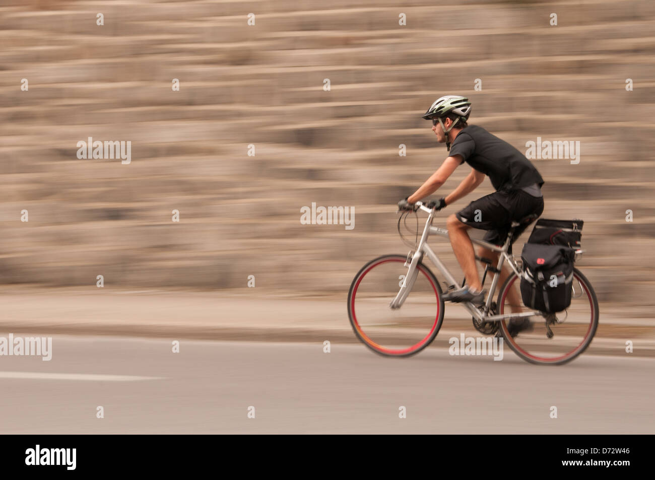Blurry cyclist hi-res stock photography and images - Alamy