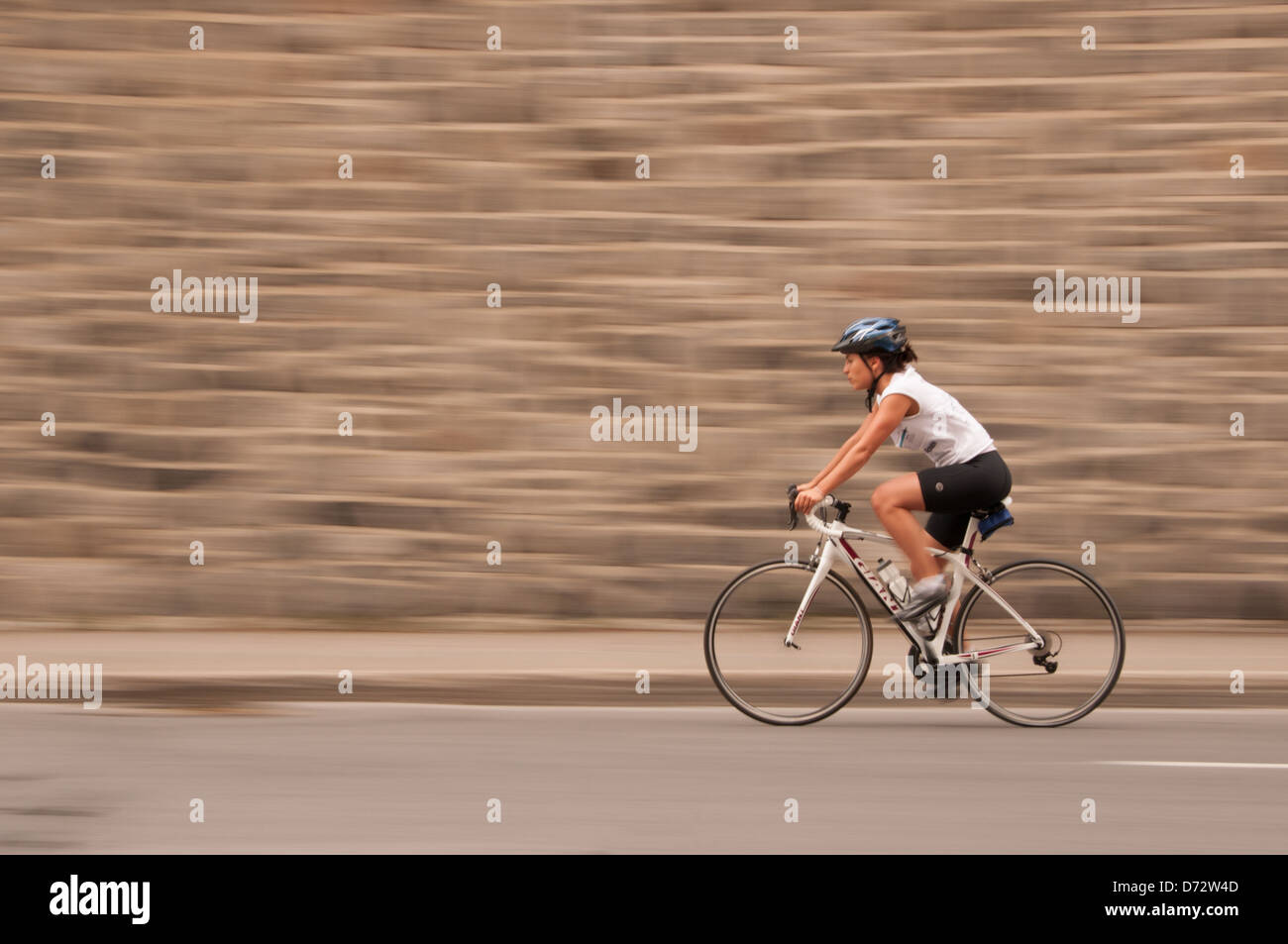 Blurry cyclist hi-res stock photography and images - Alamy