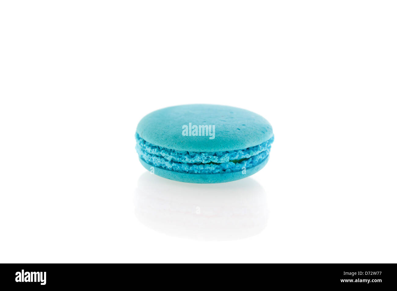 turquoise french macaroons over white background , single dessert Stock ...