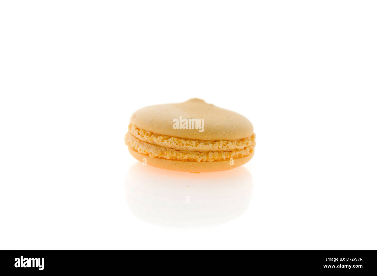 yellow french macaroons over white background , single dessert Stock ...