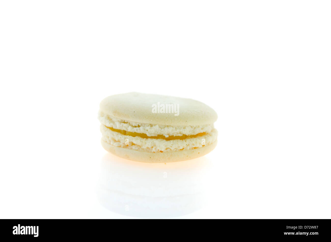 cream french macaroons over white background , single dessert Stock ...