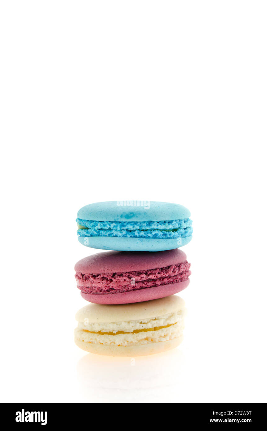 three french macaroons stack on white background Stock Photo - Alamy