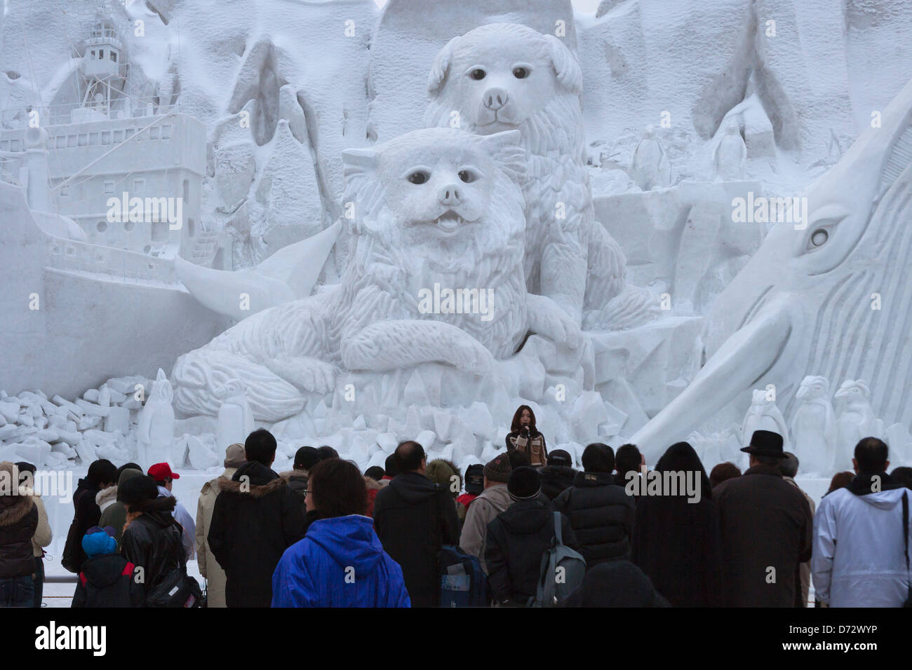 Tourists with huge snow sculptures at Snow Festival, Sapporo, Hokkaido ...