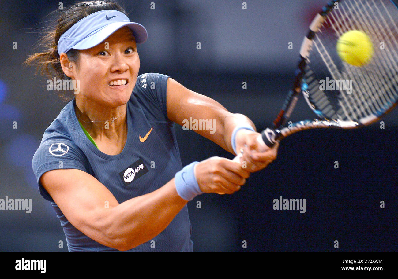 China's Li Na hits the ball during the semi-final match against USA's ...