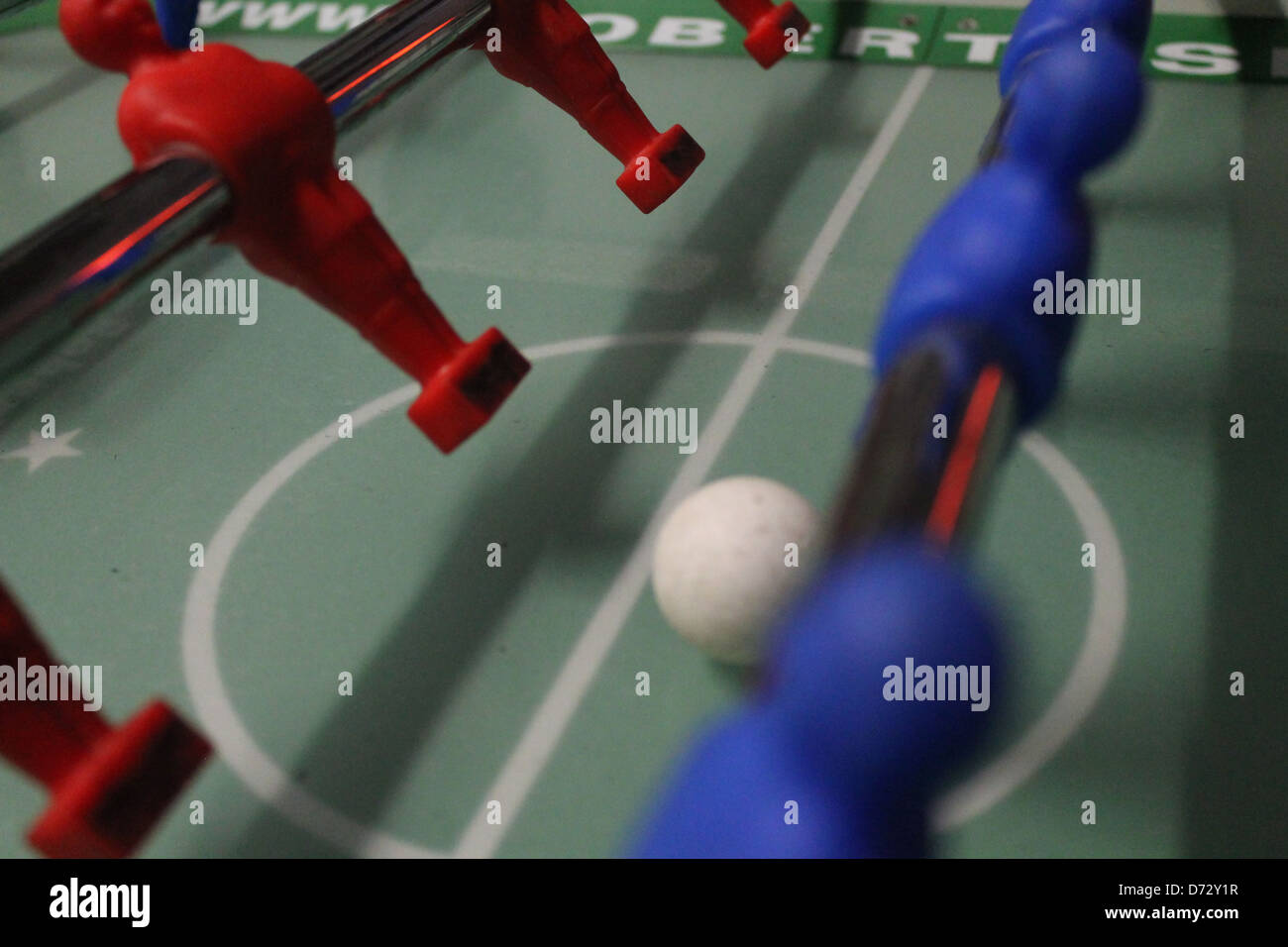Table football. Eternal battle Red VS Blue Stock Photo - Alamy