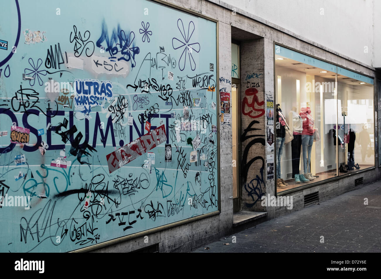 Grafitti on a storefront Karlsruhe Germany Stock Photo - Alamy