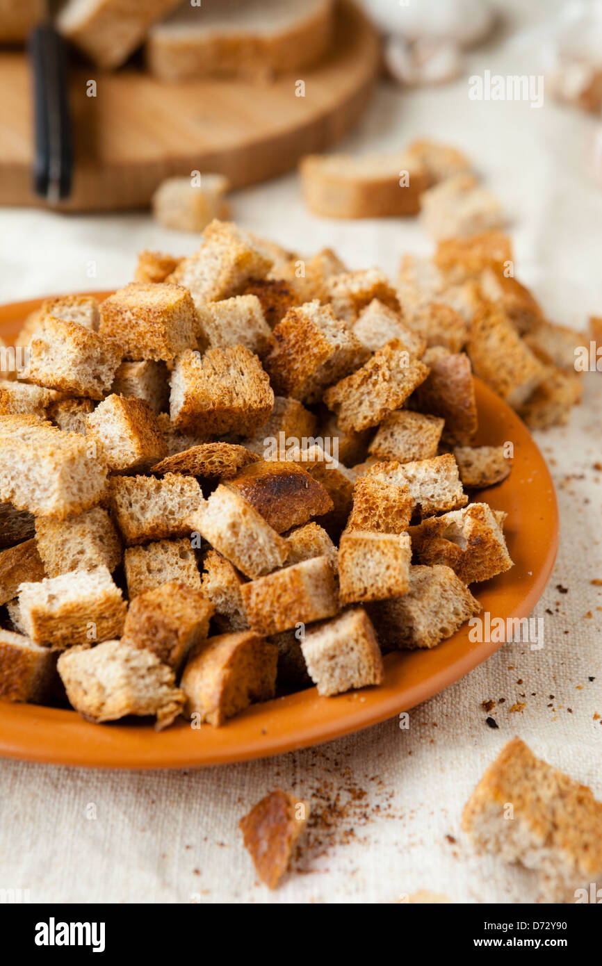 bread croutons on a large plate, closeup Stock Photo - Alamy