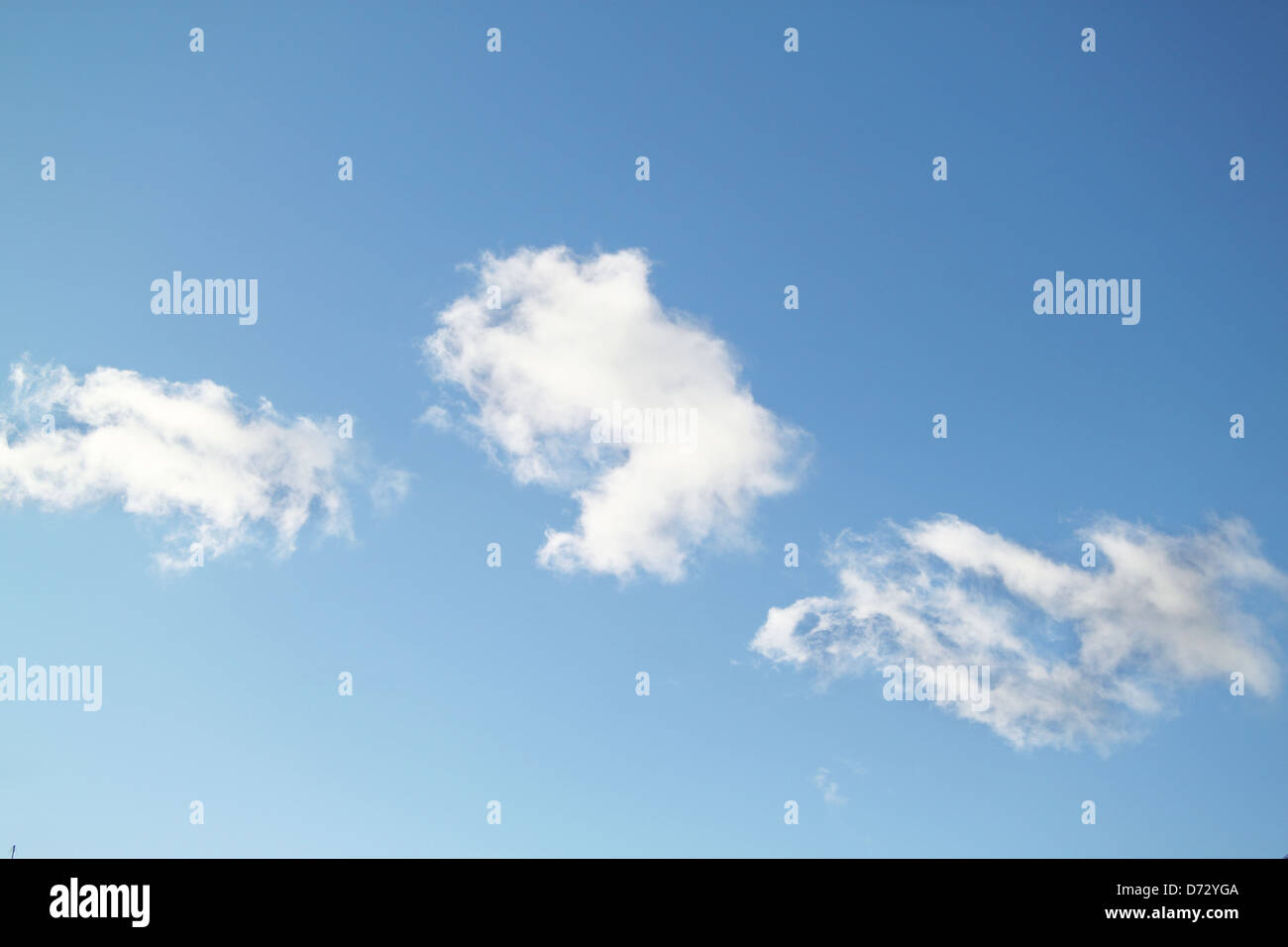 Three white clouds Stock Photo - Alamy