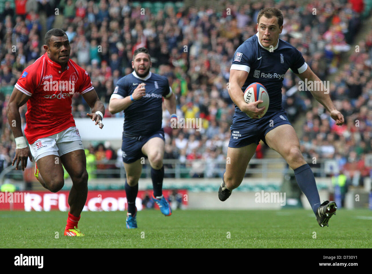Captain Dave Pascoe of the Navy scores a try in The 2013 Annual rugby ...