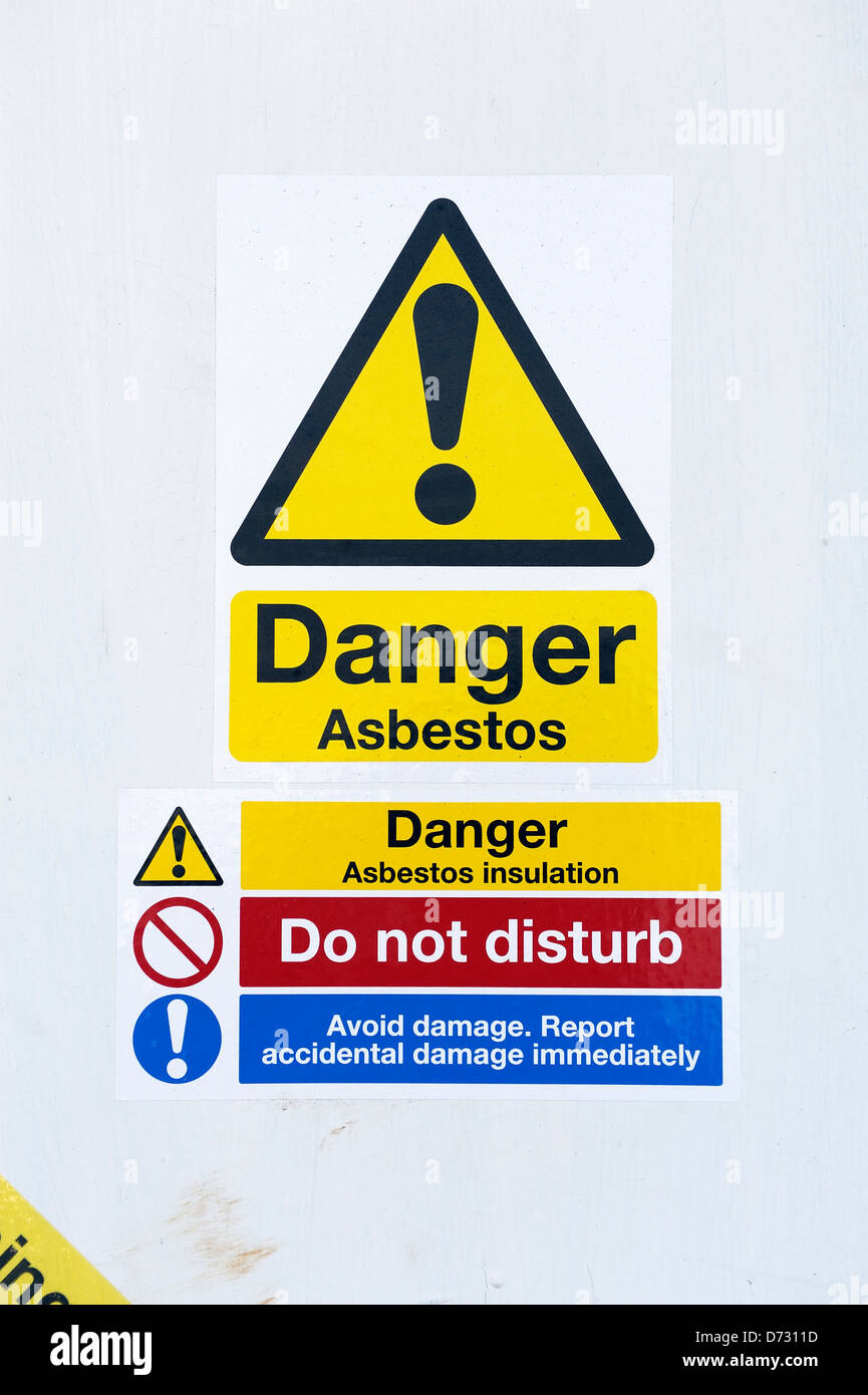 Danger asbestos sign england uk Stock Photo - Alamy