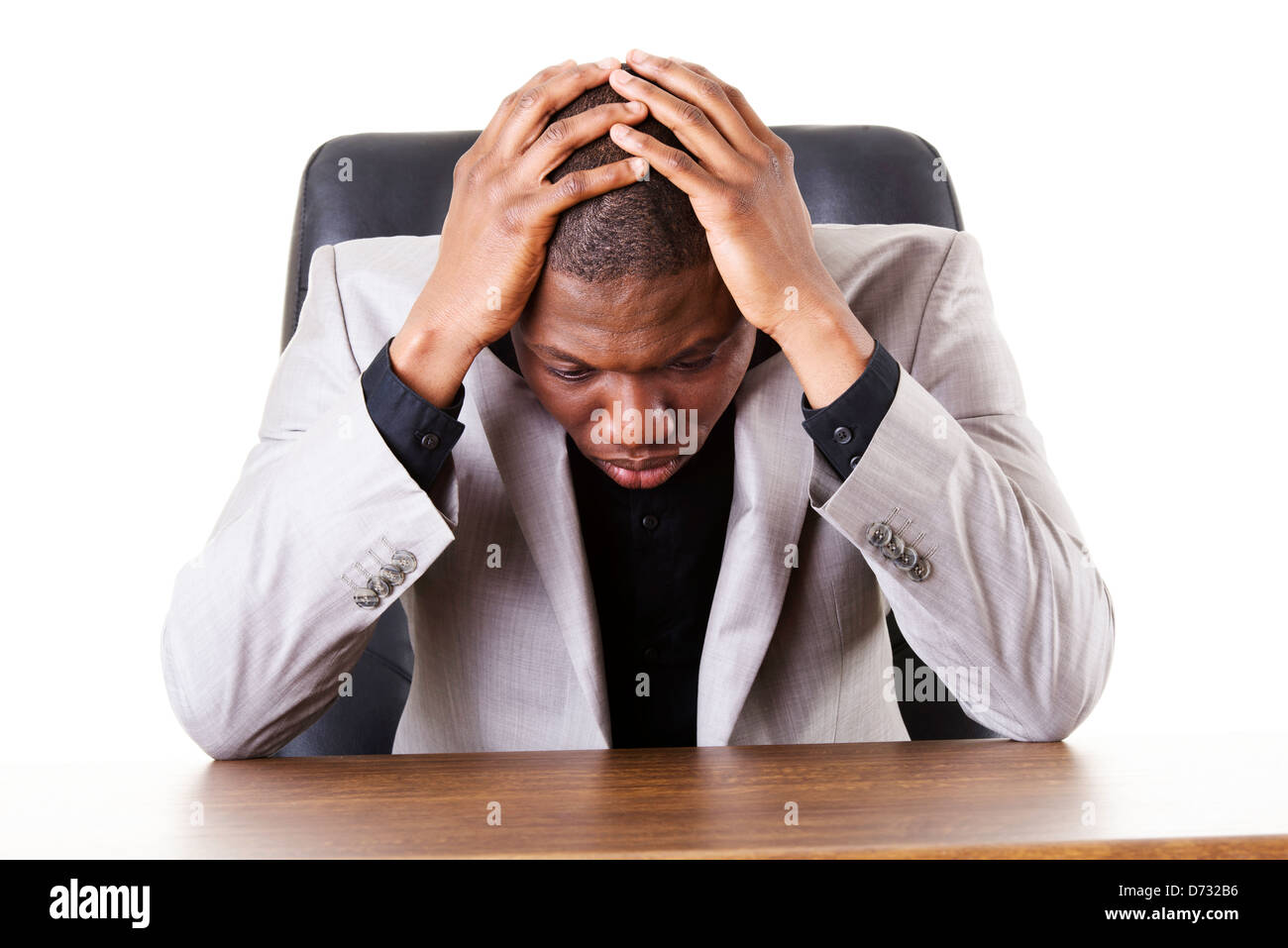 Sad, tired or depressed businessman at the desk Stock Photo - Alamy