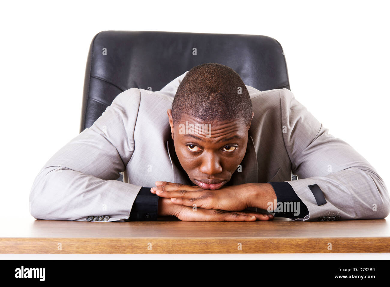 Sad, tired or depressed businessman at the desk Stock Photo - Alamy