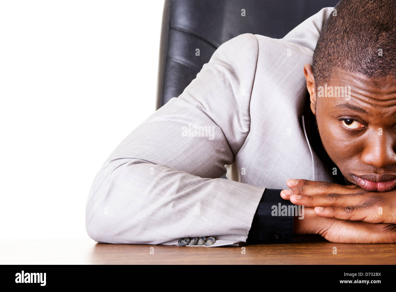 Sad, tired or depressed businessman at the desk Stock Photo - Alamy