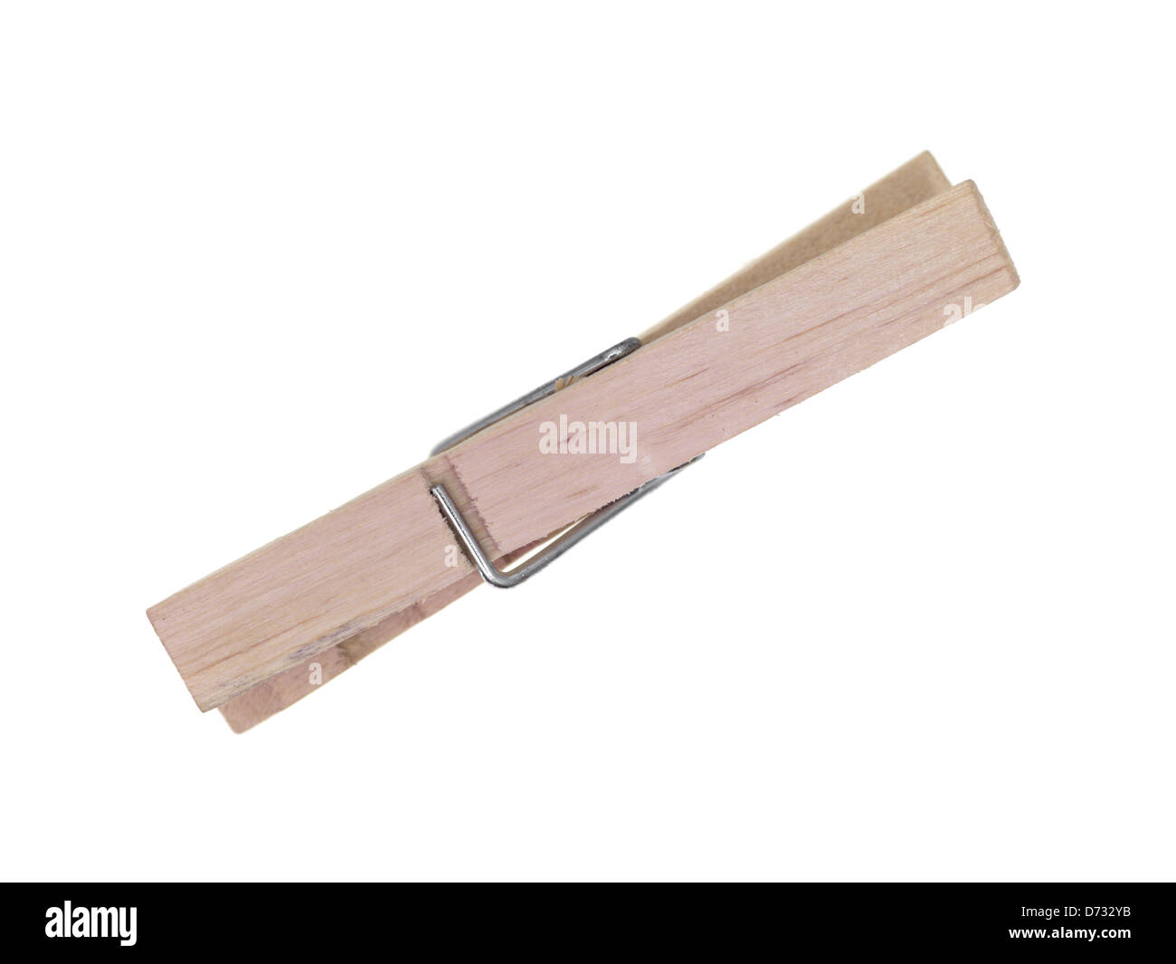 A wooden peg isolated against a white background Stock Photo - Alamy