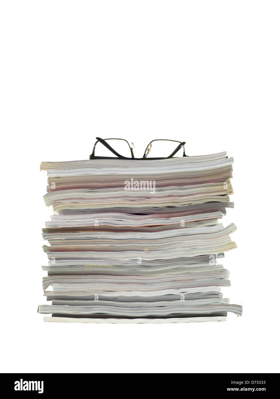 A stack of magazines isolated against a white background Stock Photo ...
