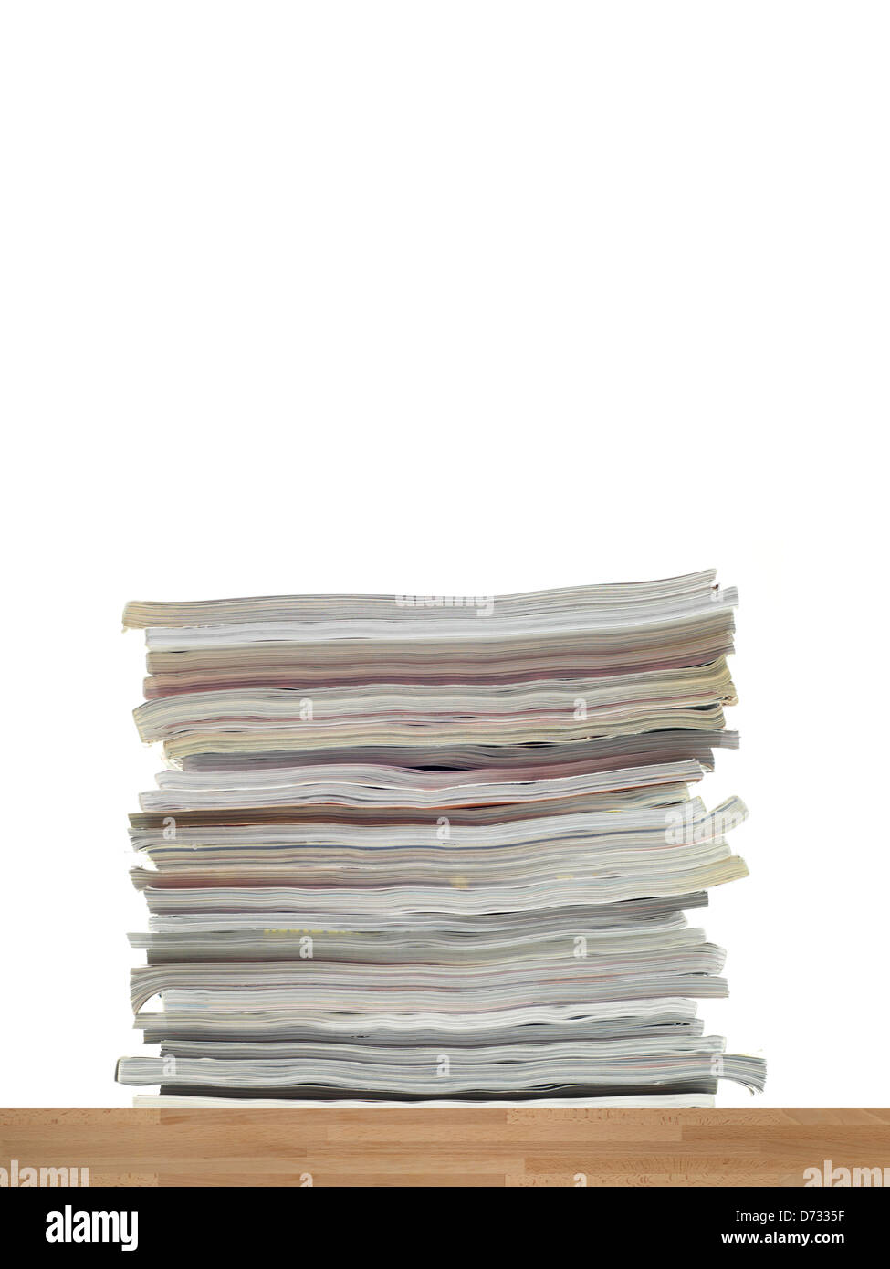 A stack of magazines isolated against a white background Stock Photo ...