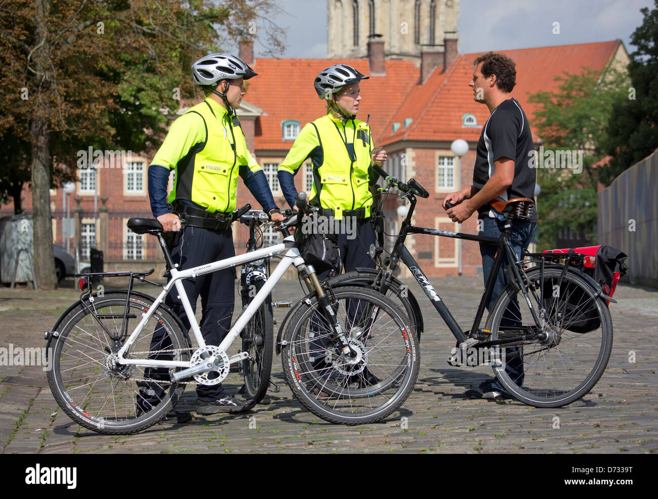 Police woman bicycle hi-res stock photography and images - Alamy