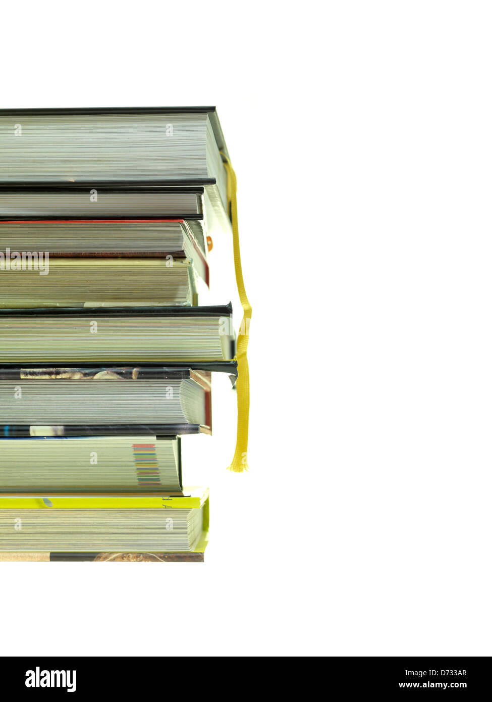A book stack isolated against a white background Stock Photo - Alamy