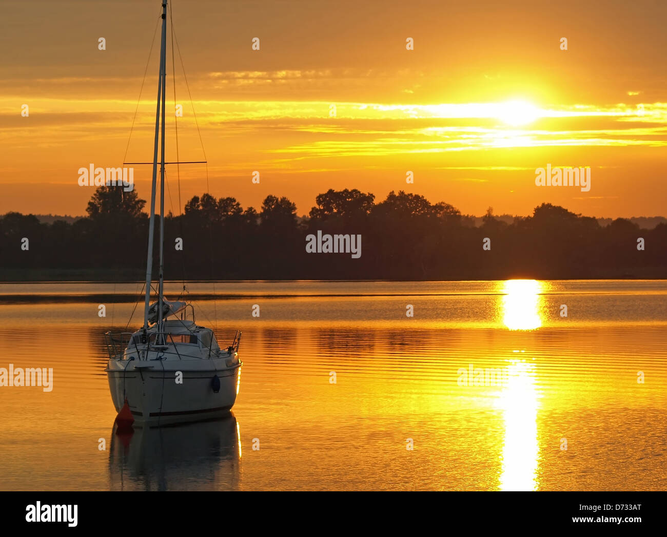 sailboat on the sunset lake Stock Photo - Alamy