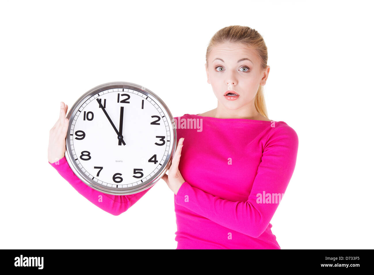 Portrait of shocked woman with clock over white background Stock Photo ...