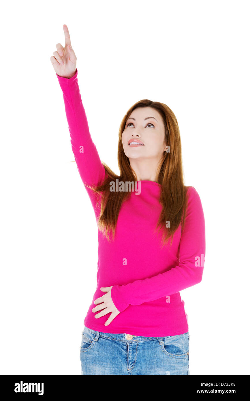 Happy , excited woman pointing on copy space, isolated on white Stock ...