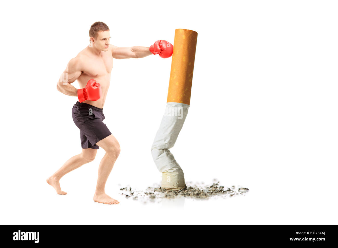 Full length portrait of a male athlete with boxing gloves, punching a ...